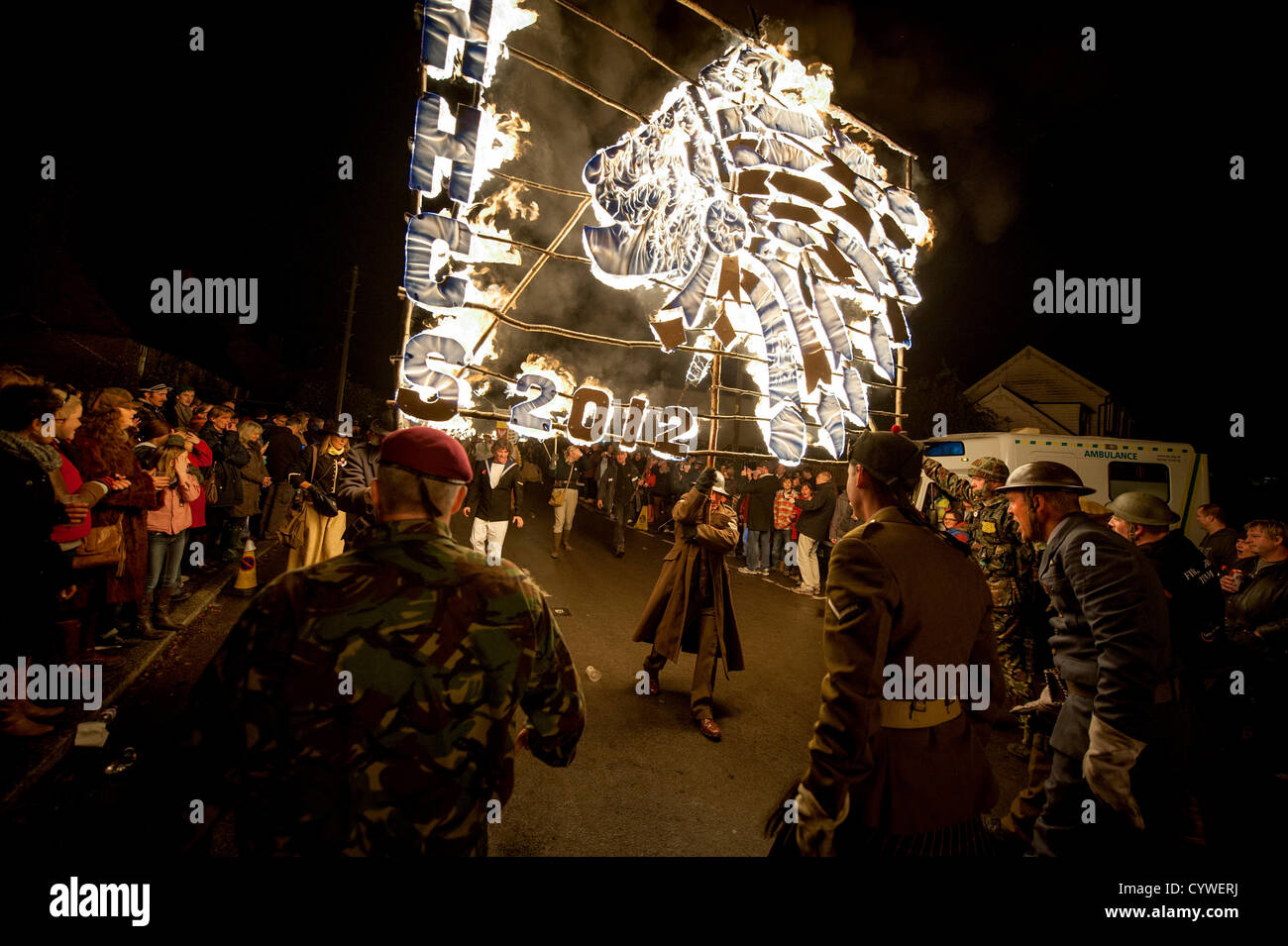 Bonfire procession for Remembrance. Thousands of spectators line the ...