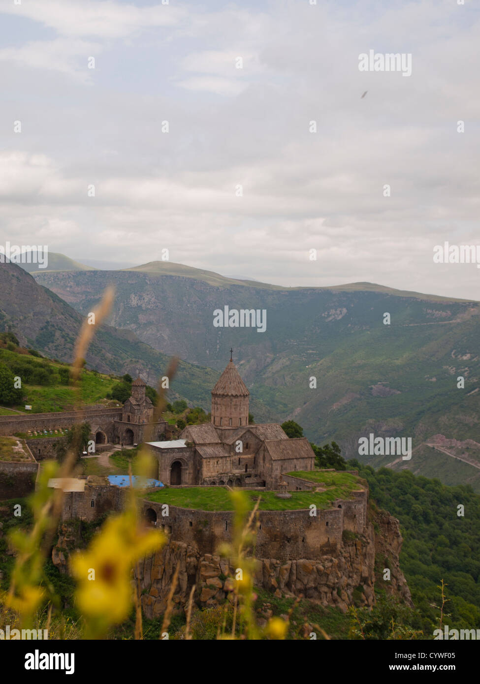 Tatev Monastery behind the flowers Stock Photo - Alamy