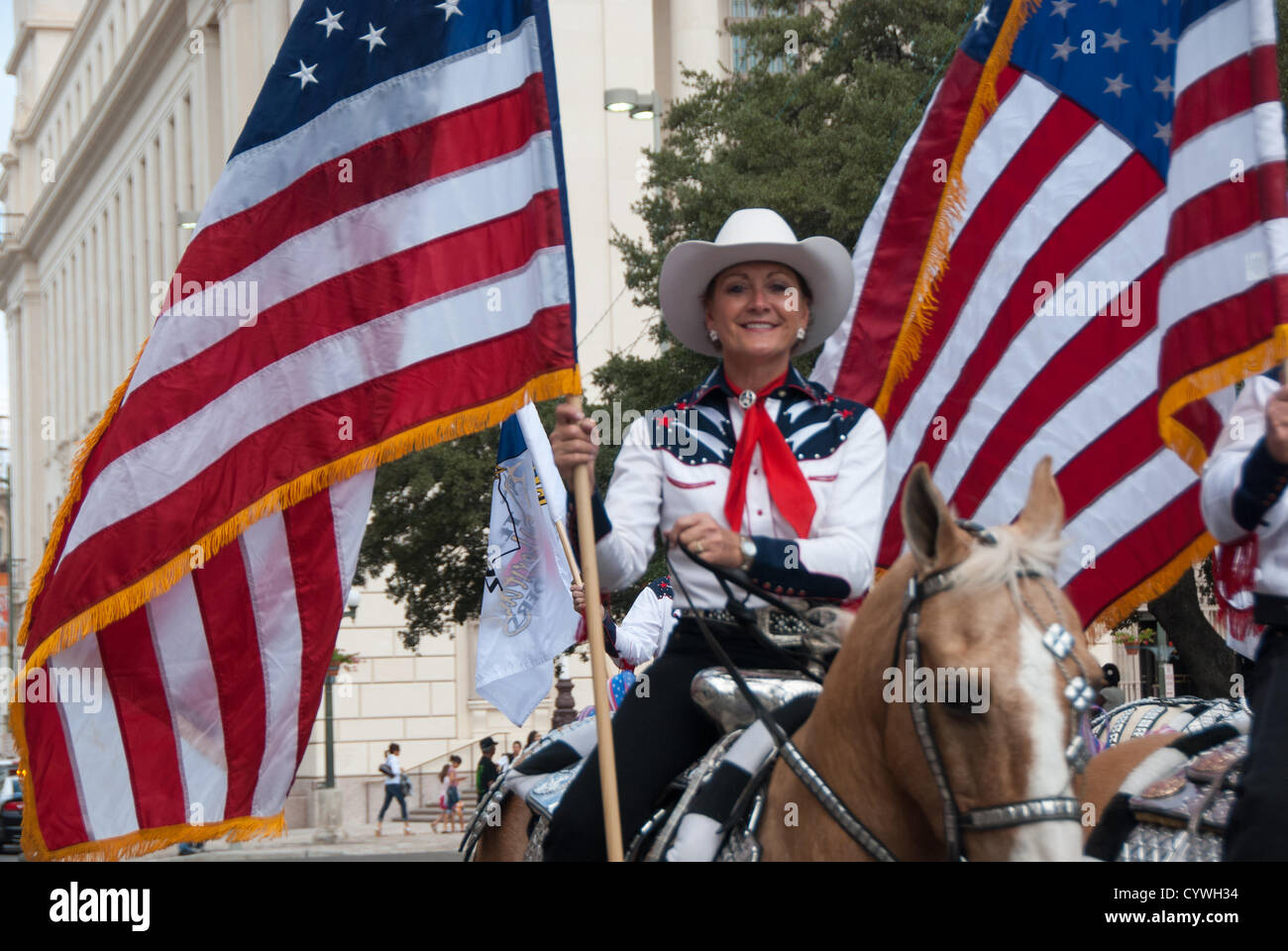 10 November 2012 San Antonio, Texas, USA - A mounted color guard rides ...