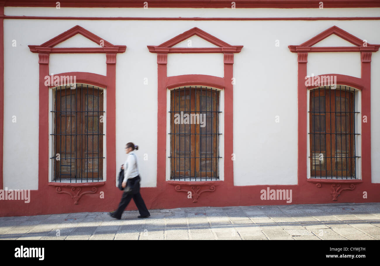 Woman walking past colonial architecture, Asuncion, Paraguay Stock ...