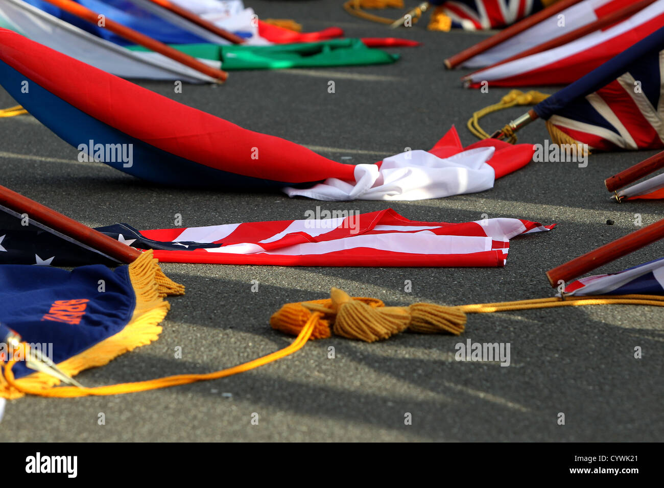 Lowered flags during a Remembrance Day service in Brighton, East Sussex ...