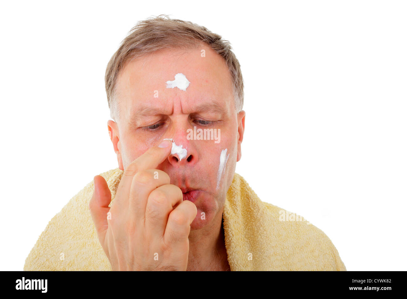 Man applying cosmetics Stock Photo - Alamy
