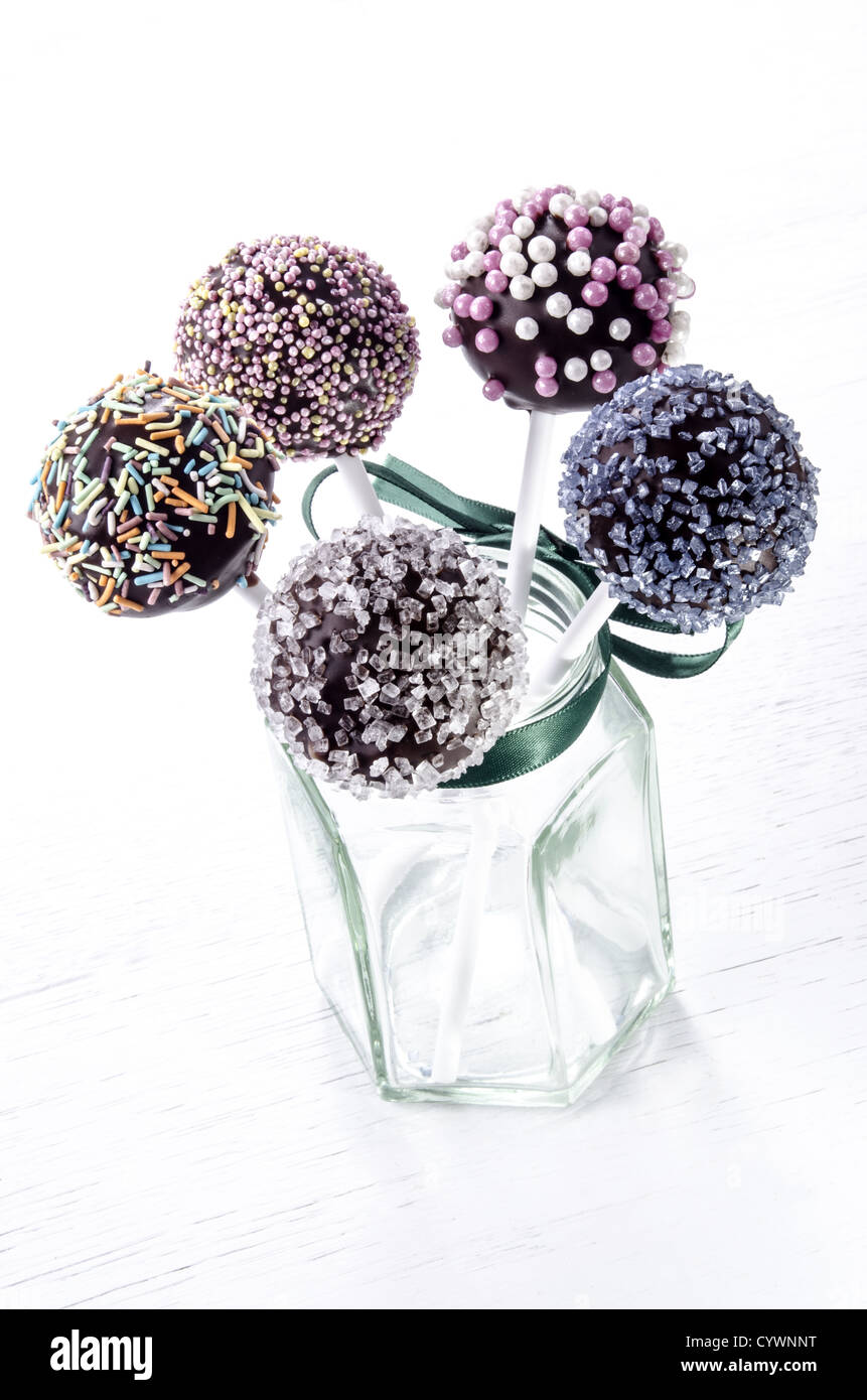 cake pop with coloured sprinkles in a glass Stock Photo - Alamy