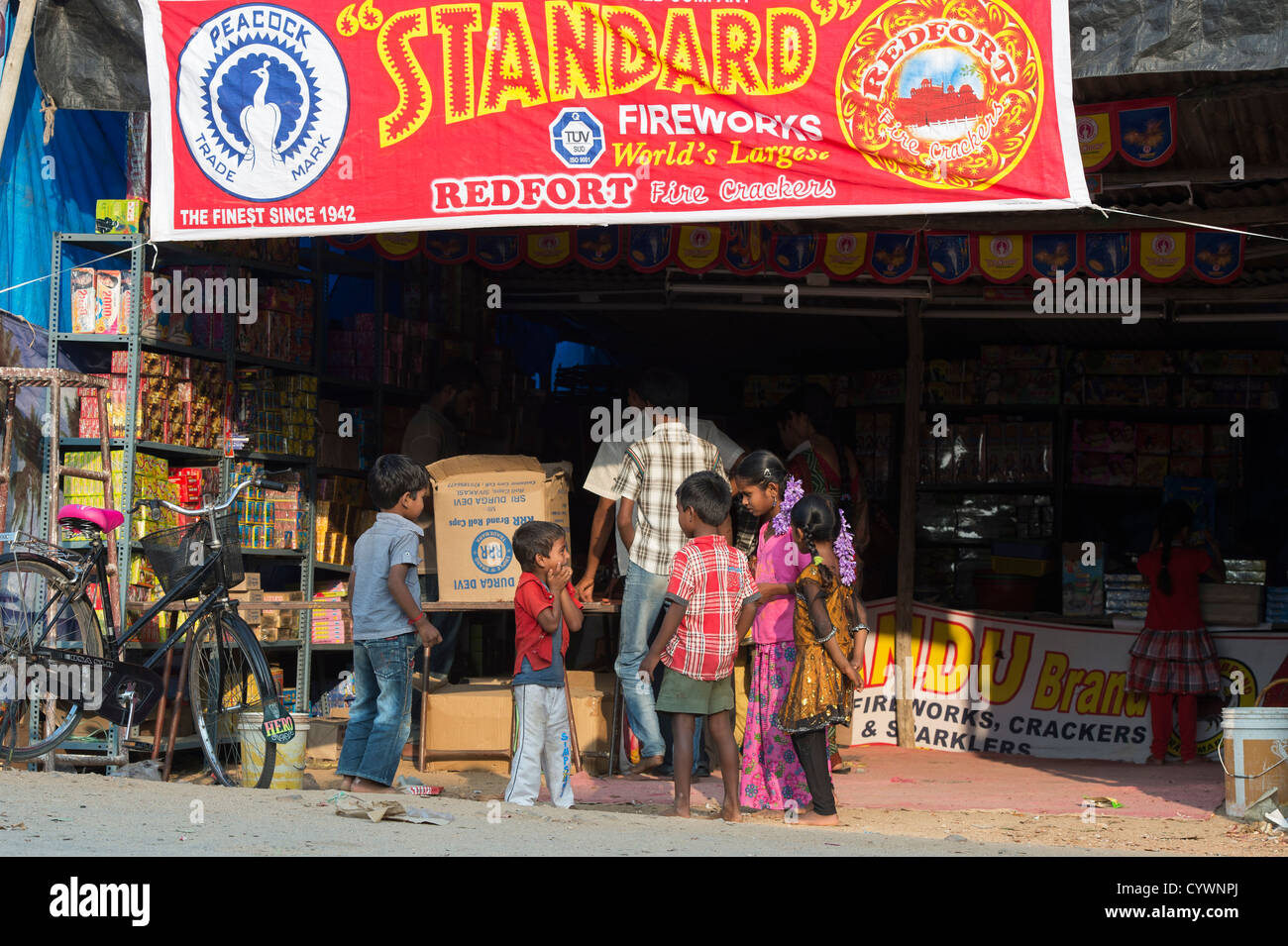 Indian children looking into a temporary Indian firework shop at Diwali ...