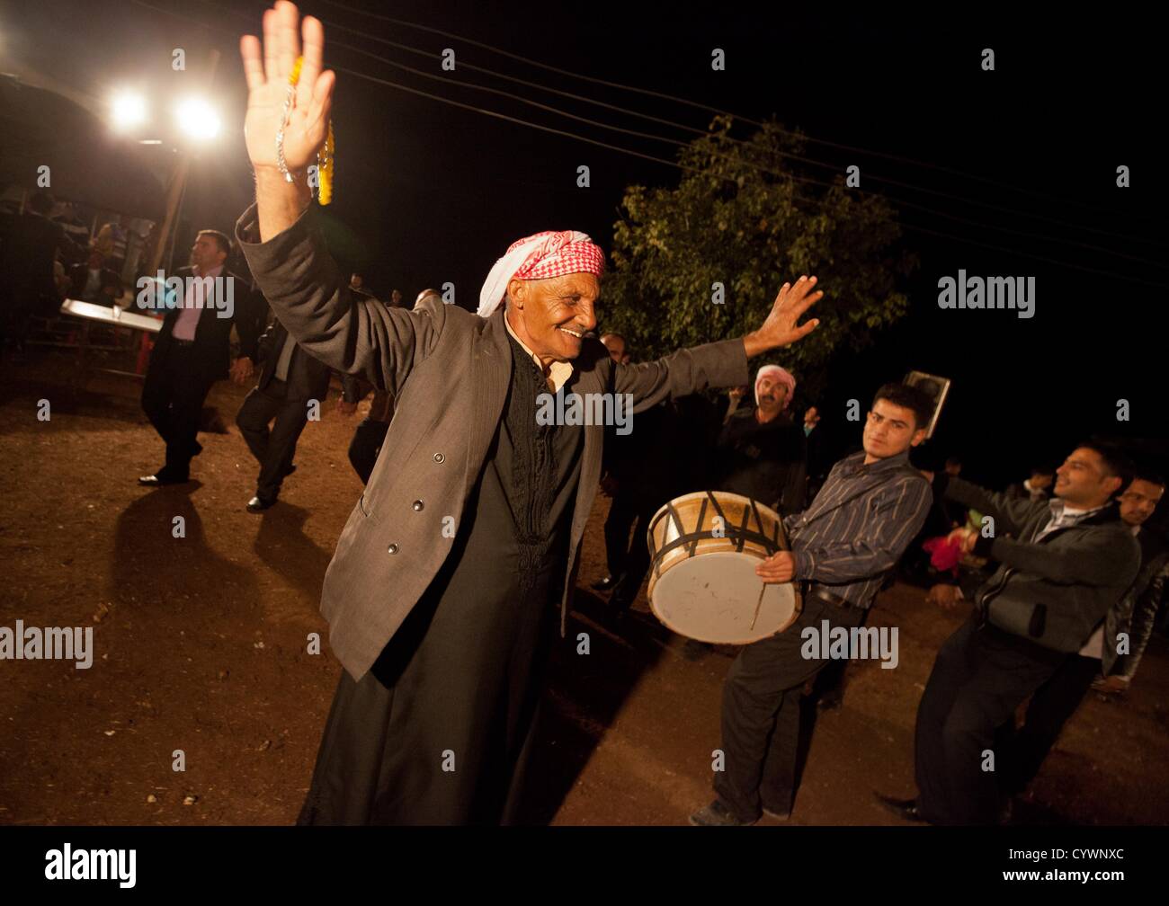 Men dance play instruments during kurdish sunni wedding war aleppo hi ...