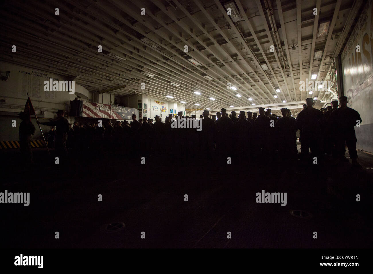 Marines and sailors aboard the USS Wasp, part of the 26th Marine ...