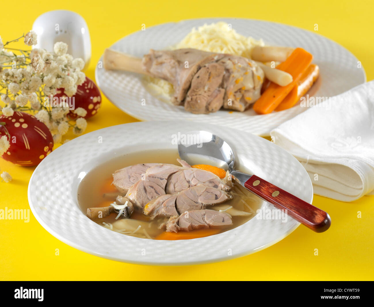 broth in white plate with painted eggs Stock Photo - Alamy