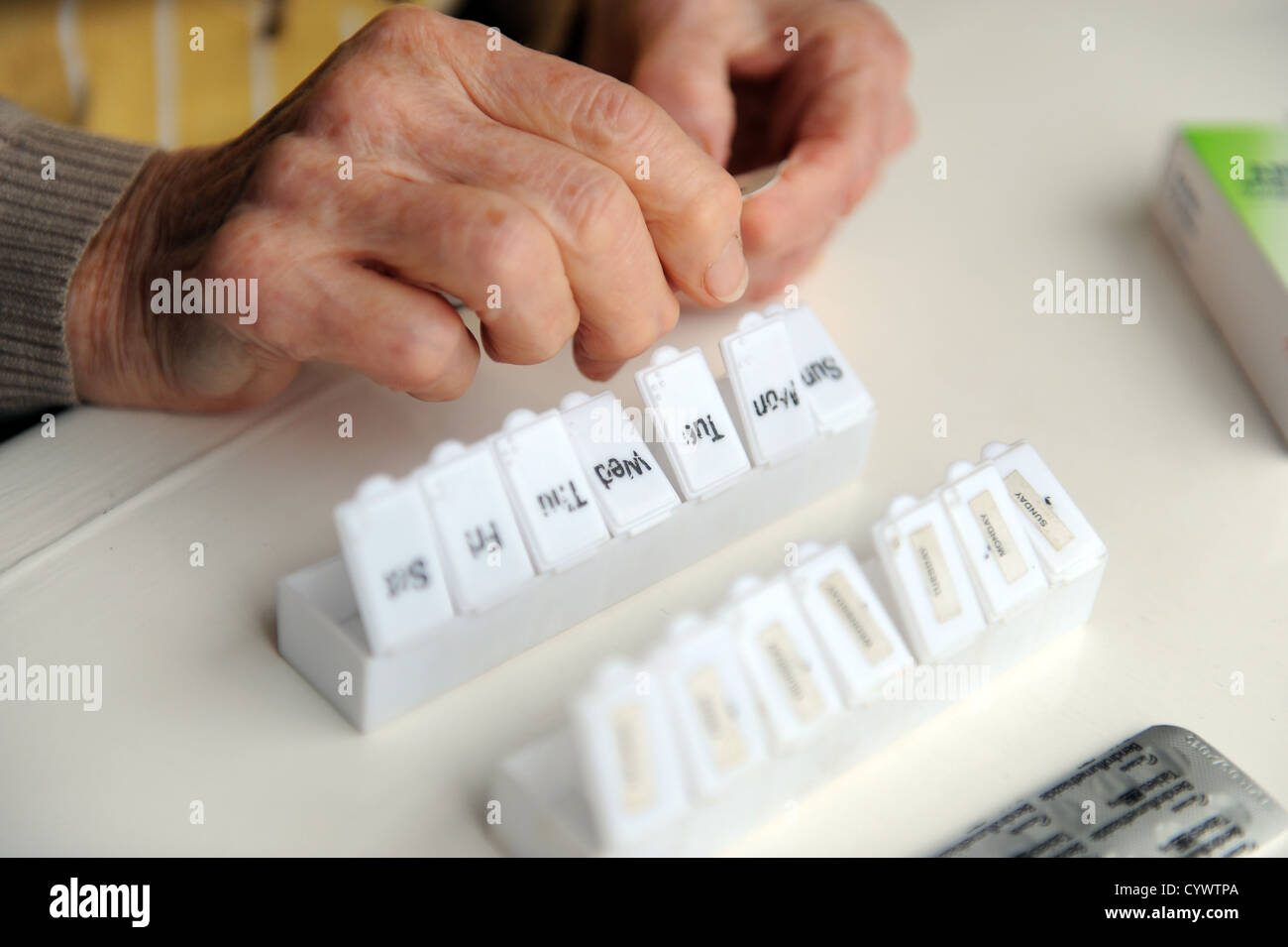 Elderly lady pill box hi-res stock photography and images - Alamy