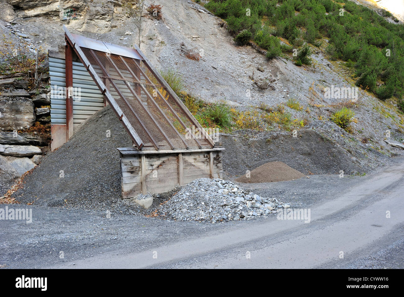 A roadside sieve, or screen, for sorting gravel to use on mountain ...