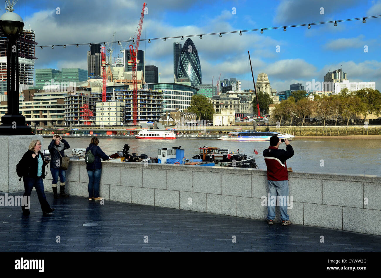 River Thames City of London and tourists Stock Photo - Alamy