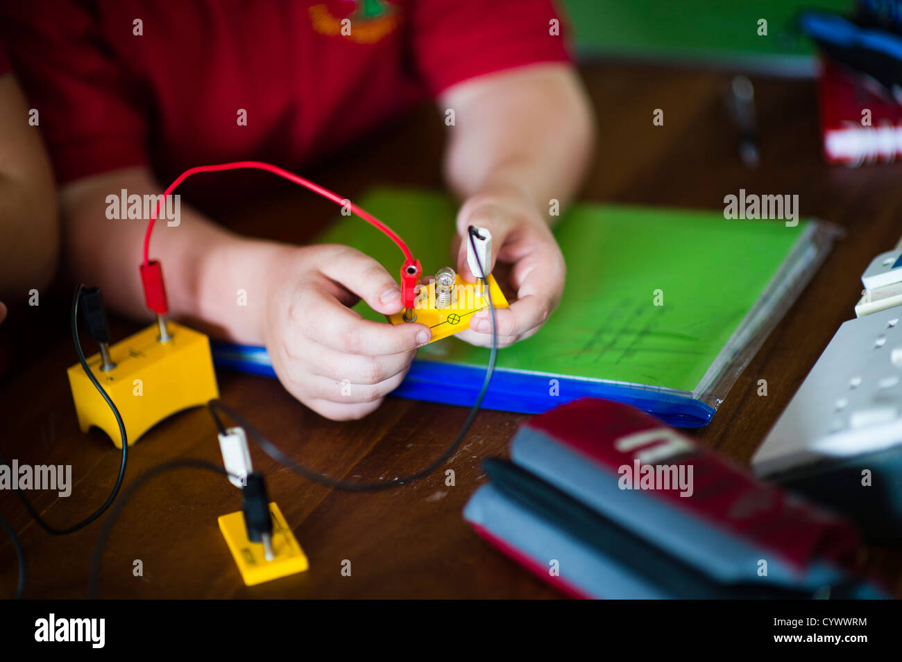 Pupils experimenting with simple electrical circuits at a secondary ...