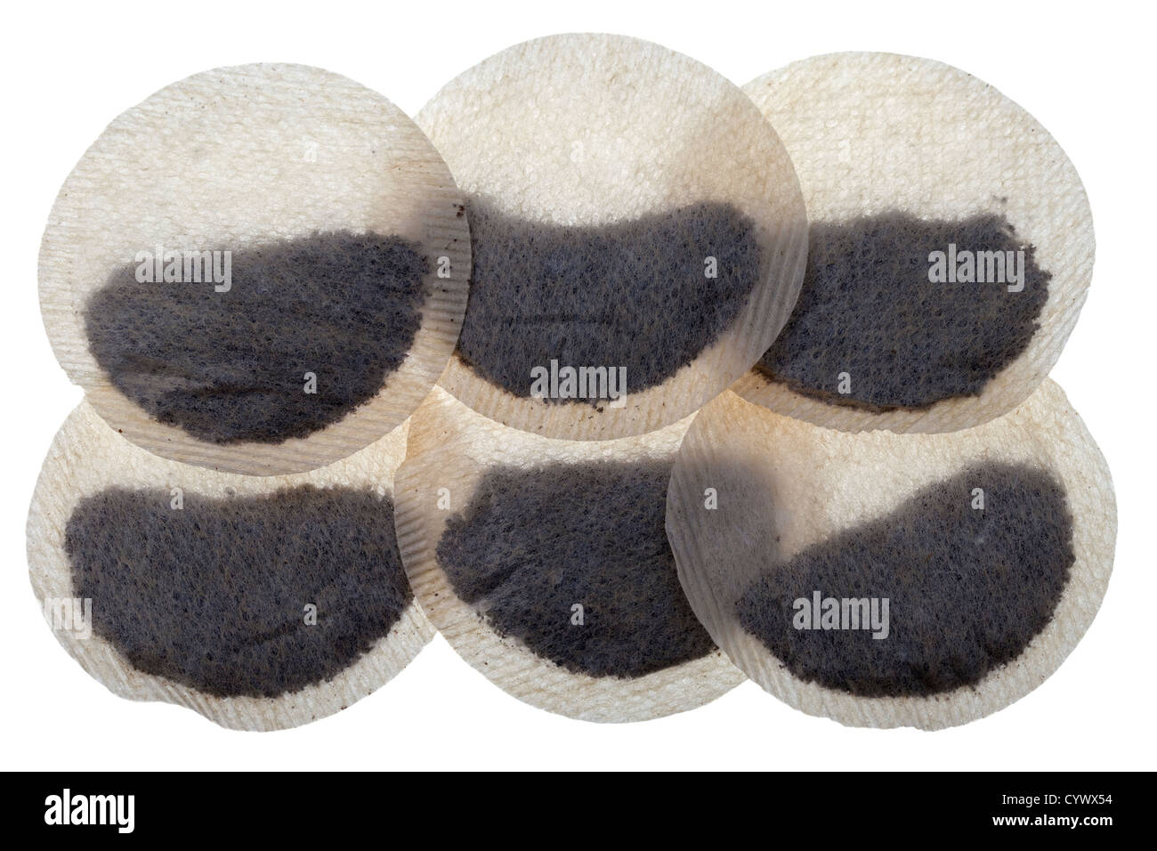 background of six paper round tea bags isolated on white Stock Photo ...