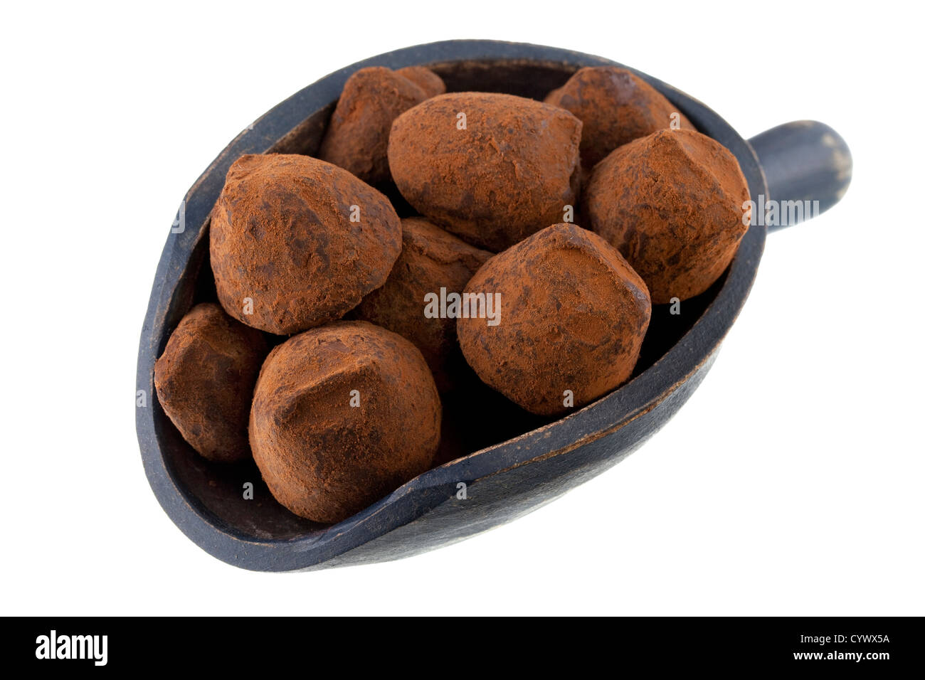 chocolate truffles on a rustic wooden scoop isolated on white Stock ...