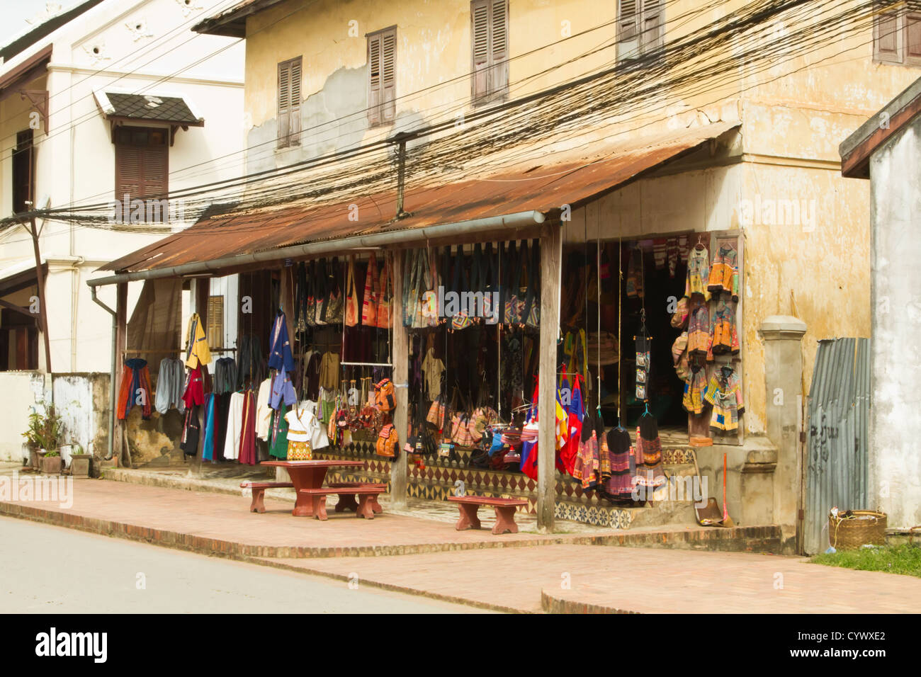 Clothes shop in Luang Prabang, Laos, with colourful ethnic materials ...