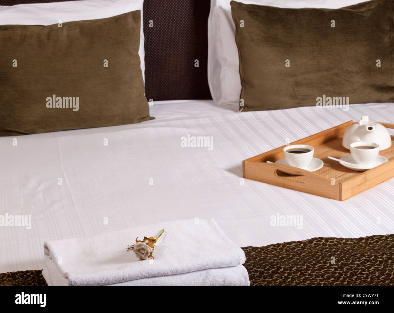 Tray with coffee on a bed in a hotel room Stock Photo - Alamy