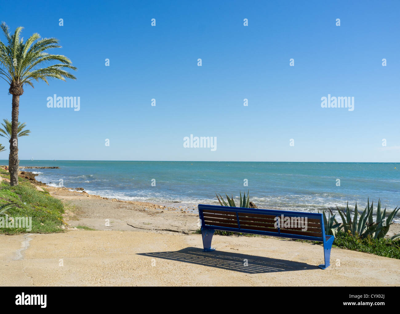 Sunny beach promenade at a Mediterranean resort Stock Photo - Alamy