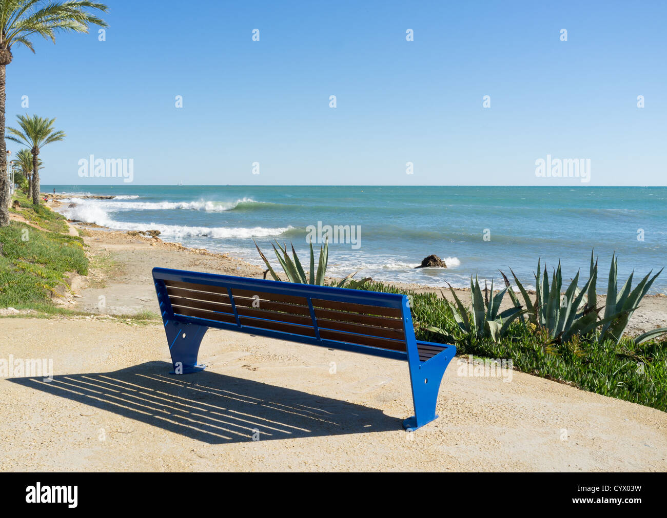 Sunny beach promenade at a Mediterranean resort Stock Photo - Alamy