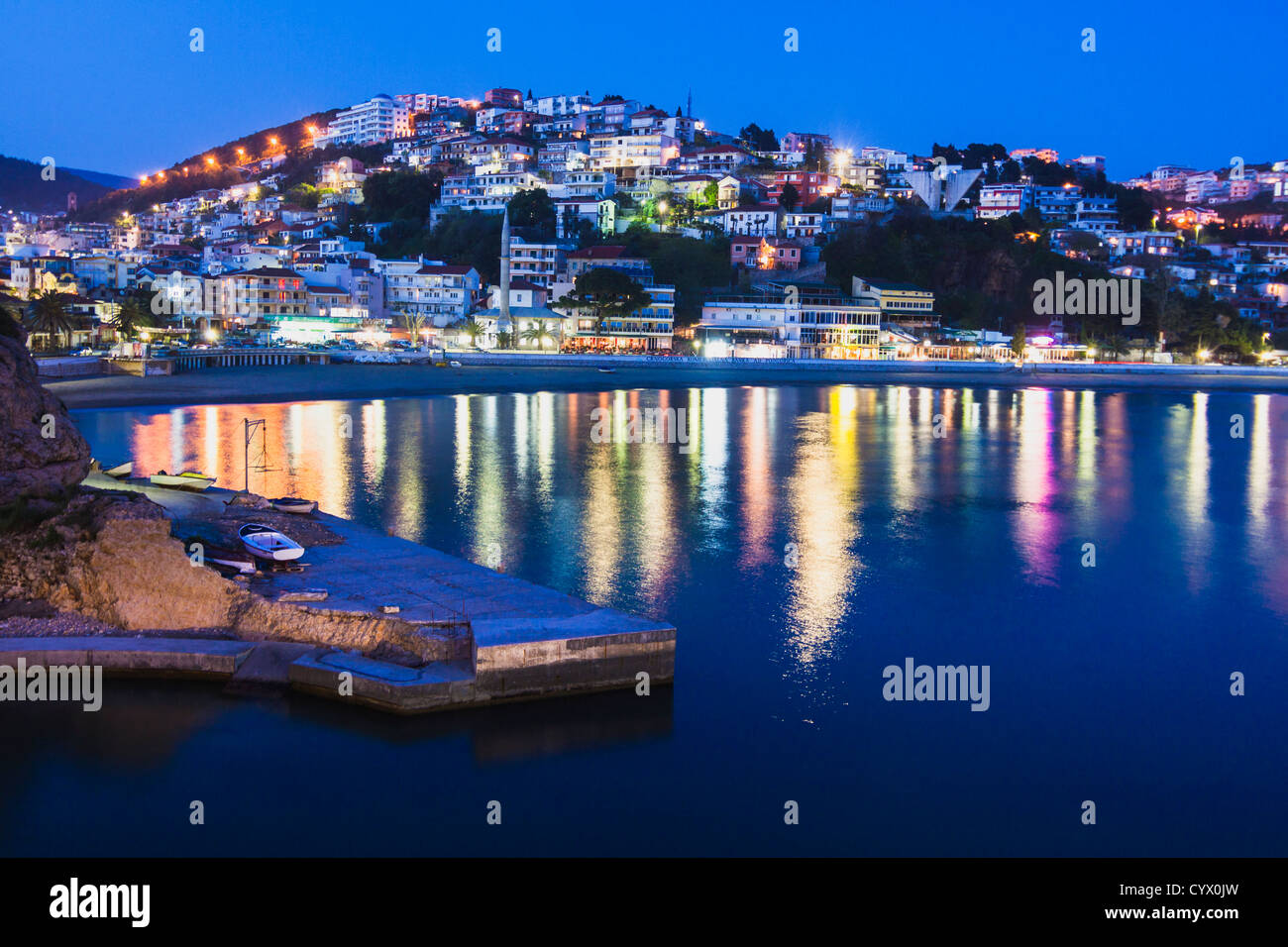 Mala Plaza beach and Ulcinj town at dusk. Montenegro Stock Photo - Alamy