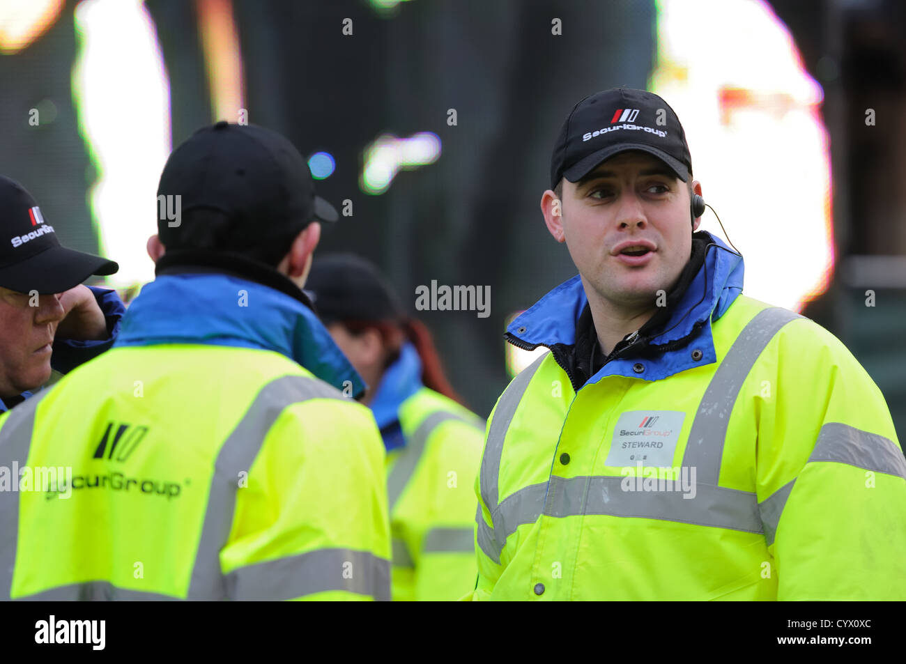 Event stewarding in high visibility clothing Stock Photo - Alamy