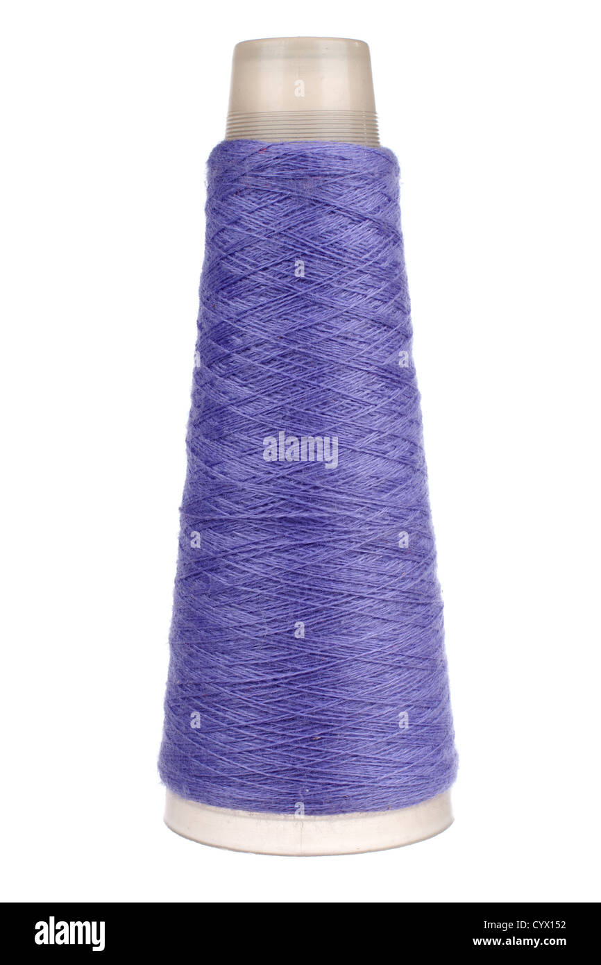 Spool of thread for knitting on a white background Stock Photo - Alamy