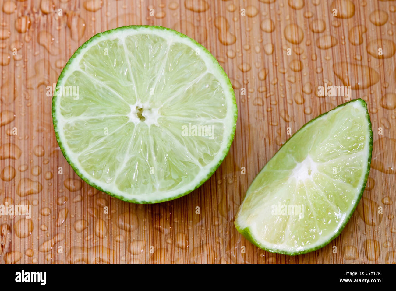 Lime cut in two Stock Photo - Alamy