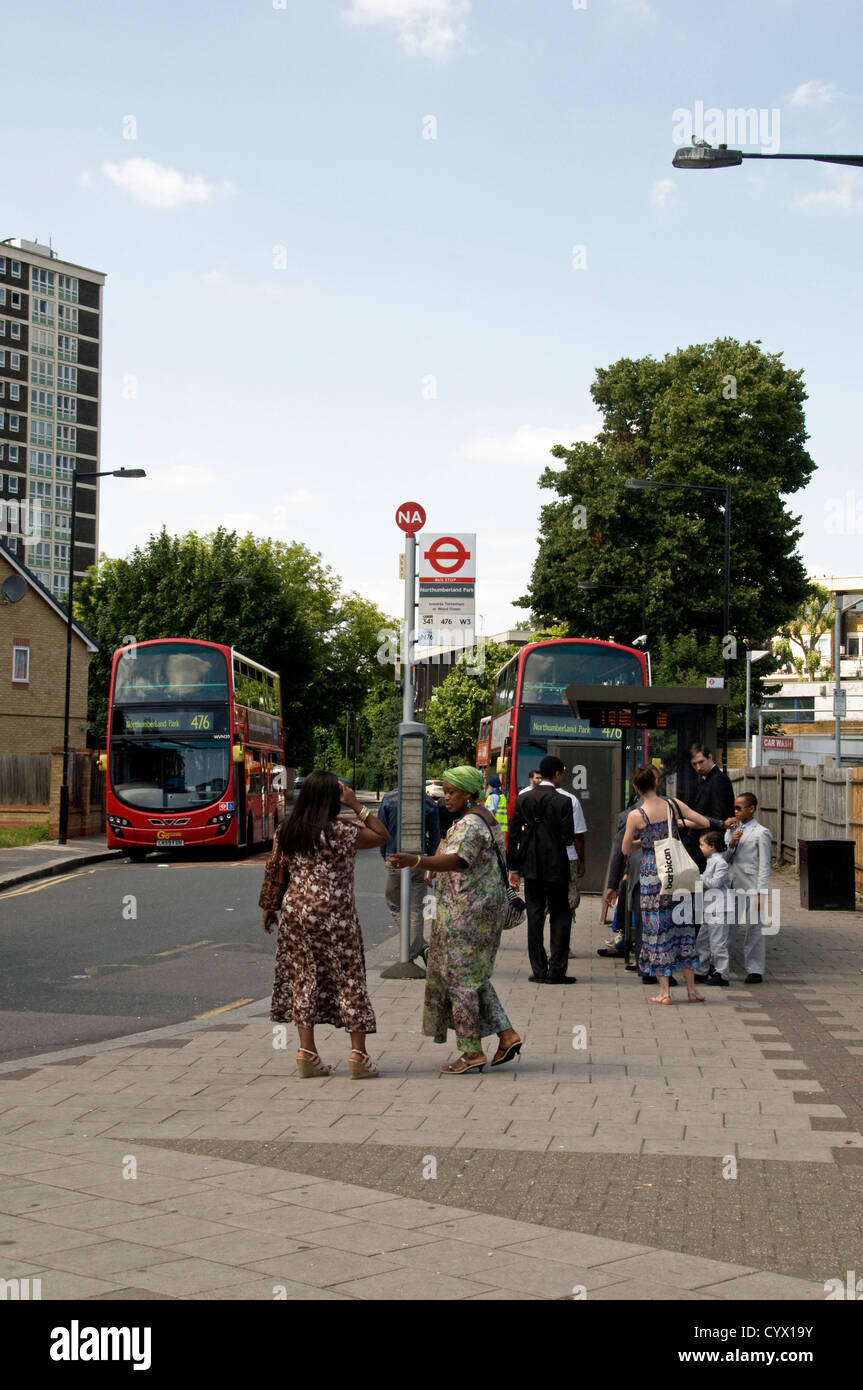 People at bus stop terminal Northumberland Park London England UK Stock ...