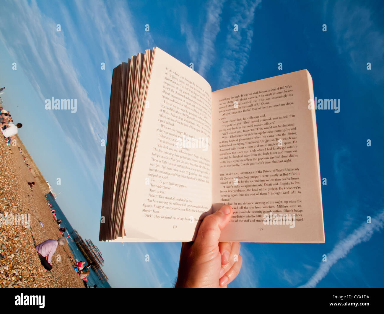 Book being read hi-res stock photography and images - Alamy