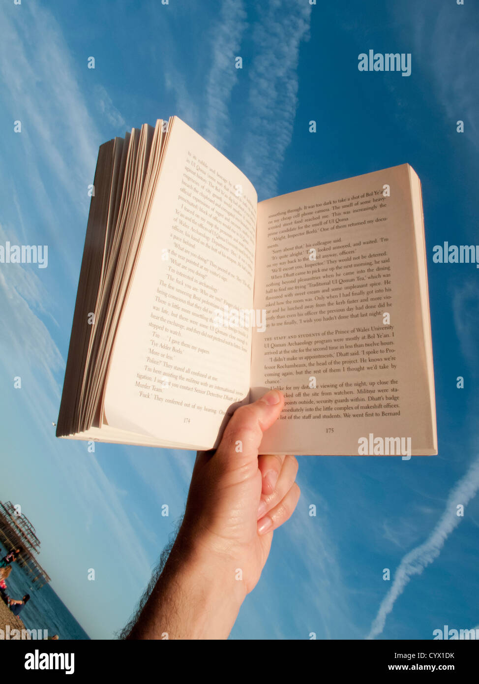 Book being read hi-res stock photography and images - Alamy