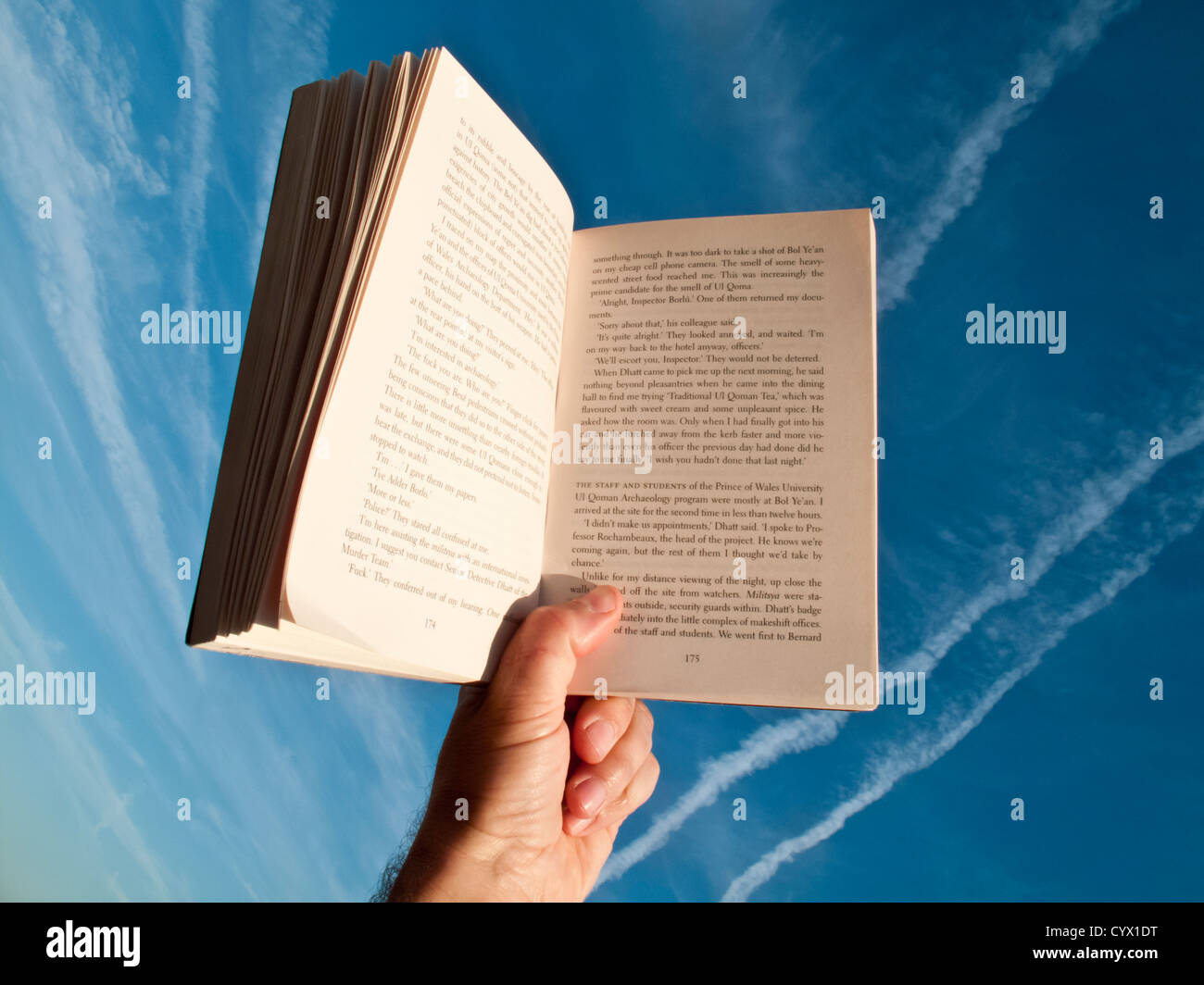 Book being read hi-res stock photography and images - Alamy