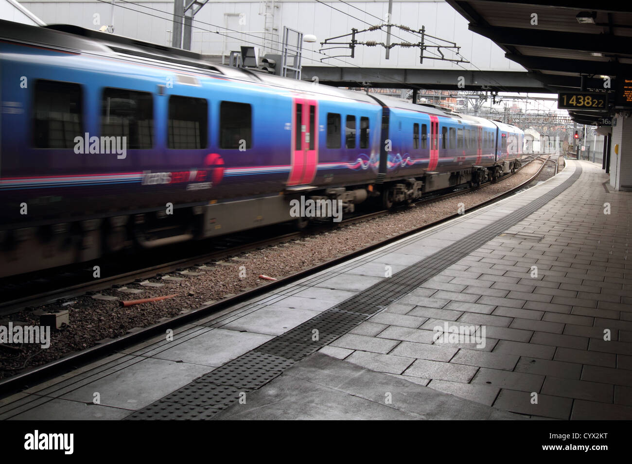 train pulling out of Leeds city train station Stock Photo - Alamy