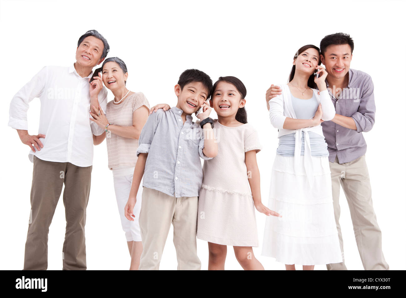 Family on the phone Stock Photo - Alamy