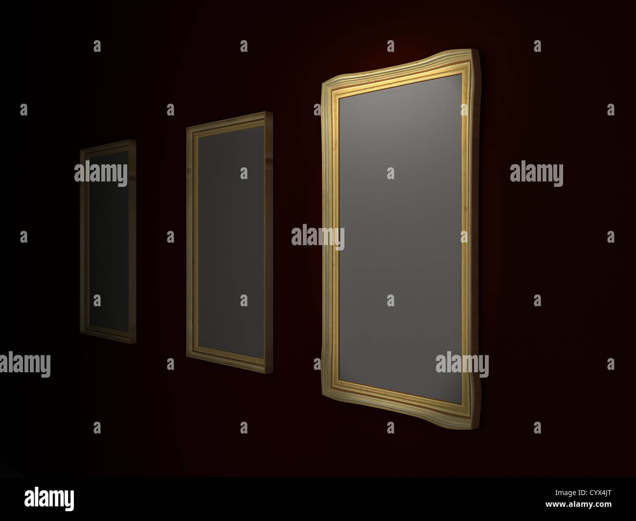 Golden Picture Frames on dark wall Stock Photo - Alamy