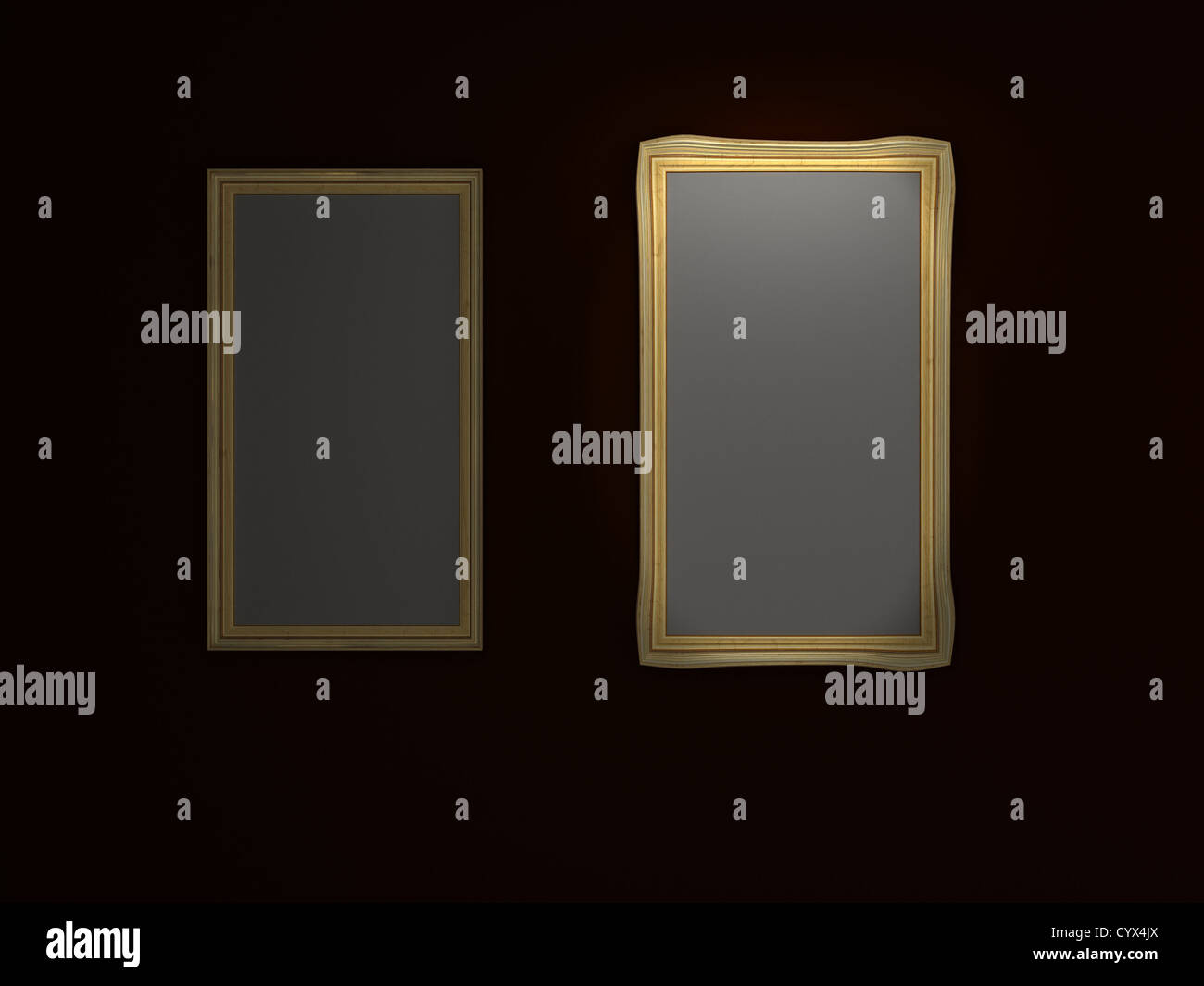 Golden Picture Frames on dark wall Stock Photo - Alamy