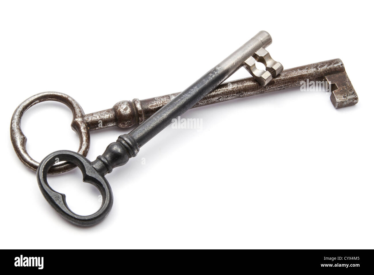 Old key isolated on white background Stock Photo - Alamy