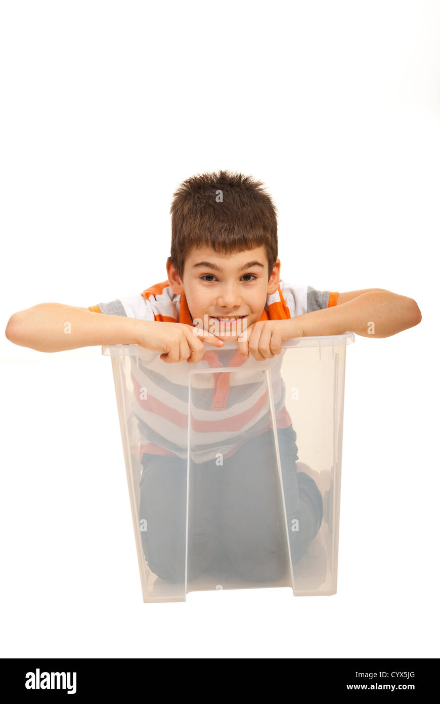 Smiling boy in a transparent box isolated on white background Stock ...