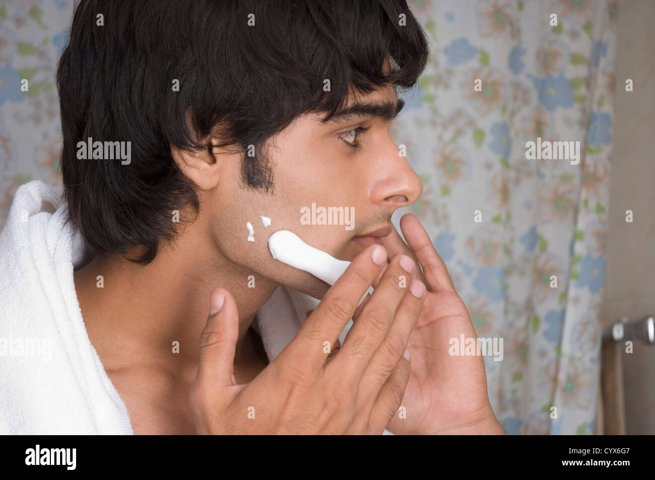 Man apply cream hair hi-res stock photography and images - Alamy