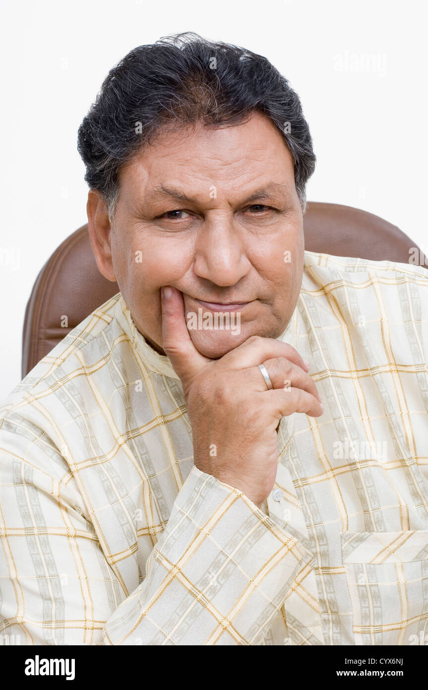 Portrait of a man thinking Stock Photo - Alamy