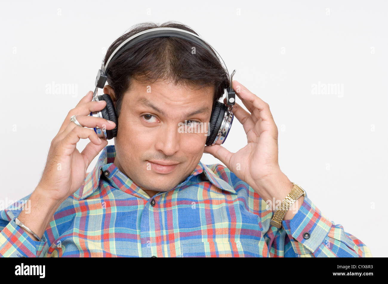 Joyful indian man headphones hi-res stock photography and images - Alamy