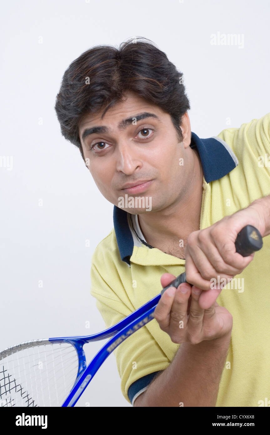 Man playing tennis Stock Photo - Alamy