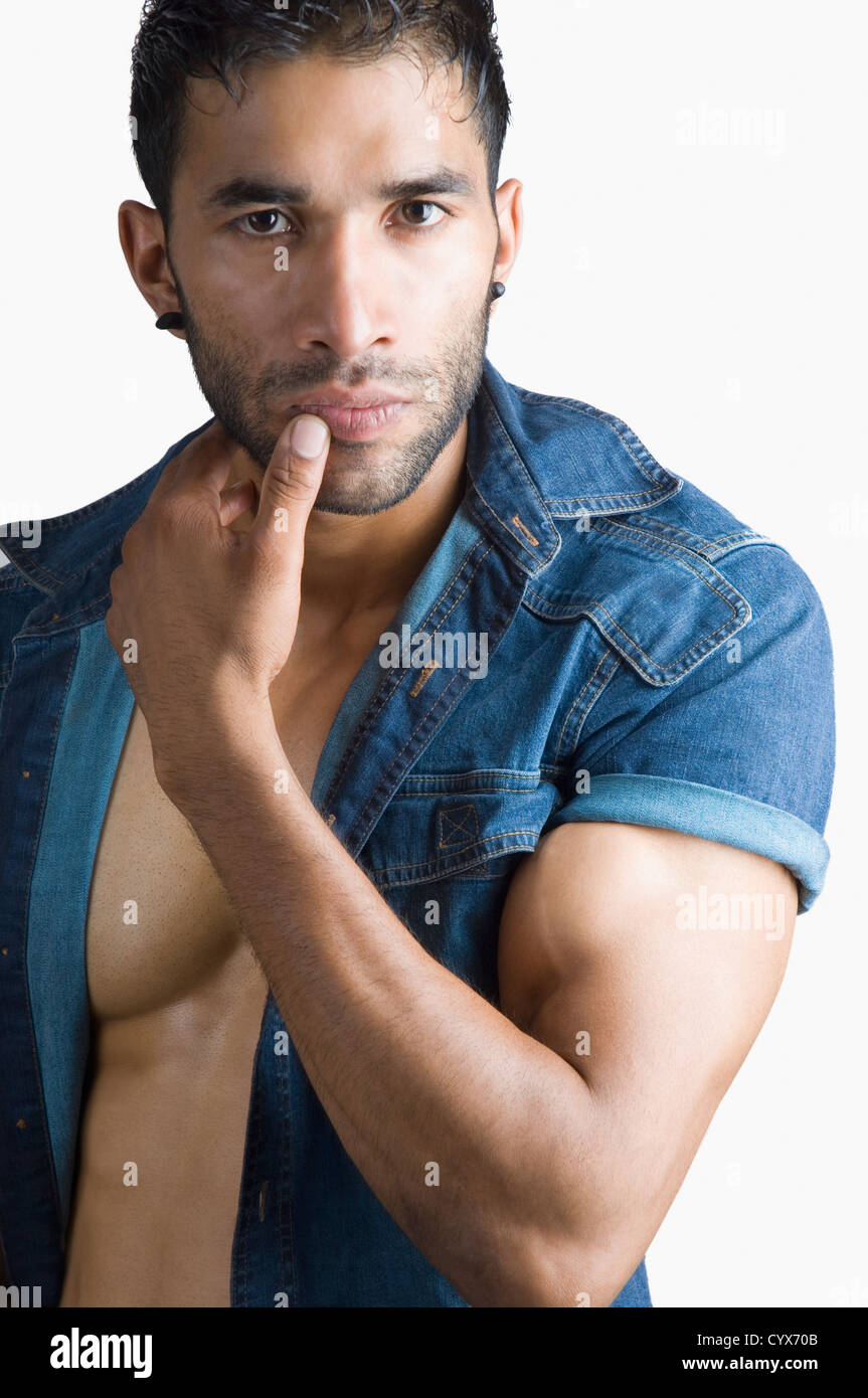 Portrait of a macho man Stock Photo - Alamy