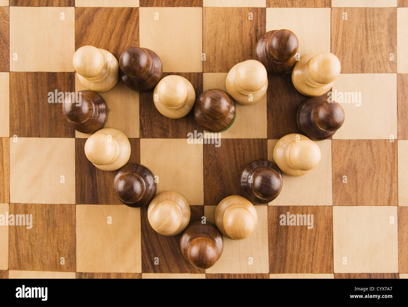 Heart shape formed with chess pieces Stock Photo - Alamy
