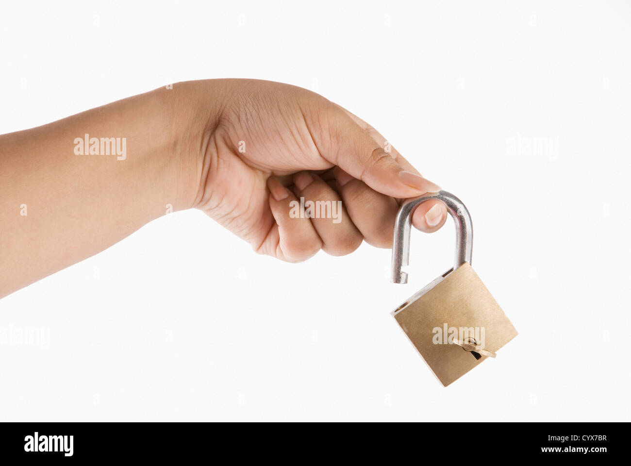 Close-up of a woman's hand holding a padlock Stock Photo - Alamy