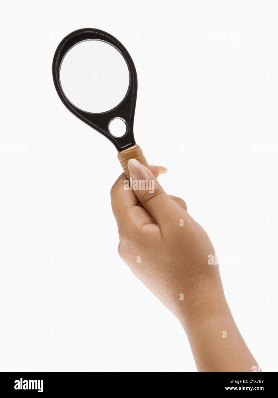 Woman holding magnifier showing hi-res stock photography and images - Alamy