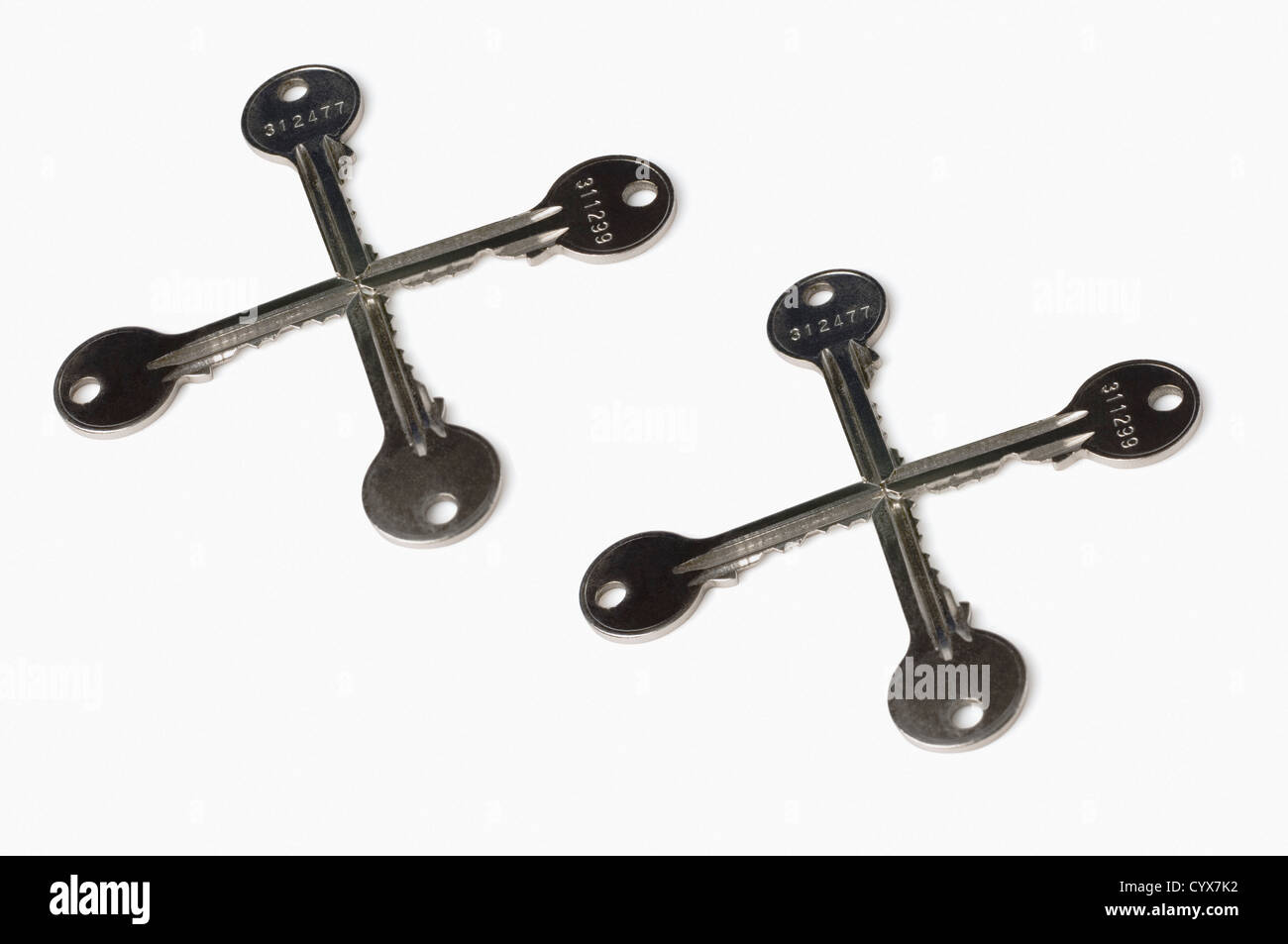 Cross shapes made from keys Stock Photo - Alamy