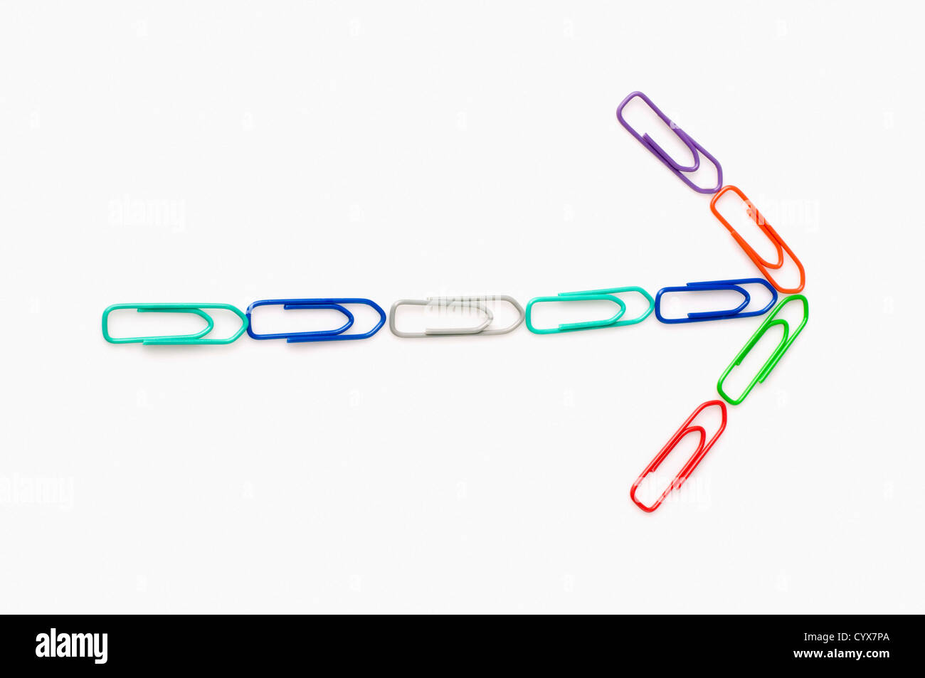 Paper clips arranged in an arrow shape Stock Photo - Alamy