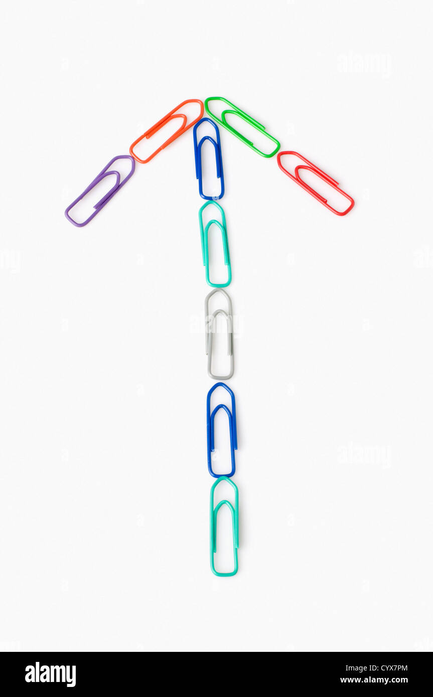 Paper clips arranged in an arrow shape Stock Photo - Alamy