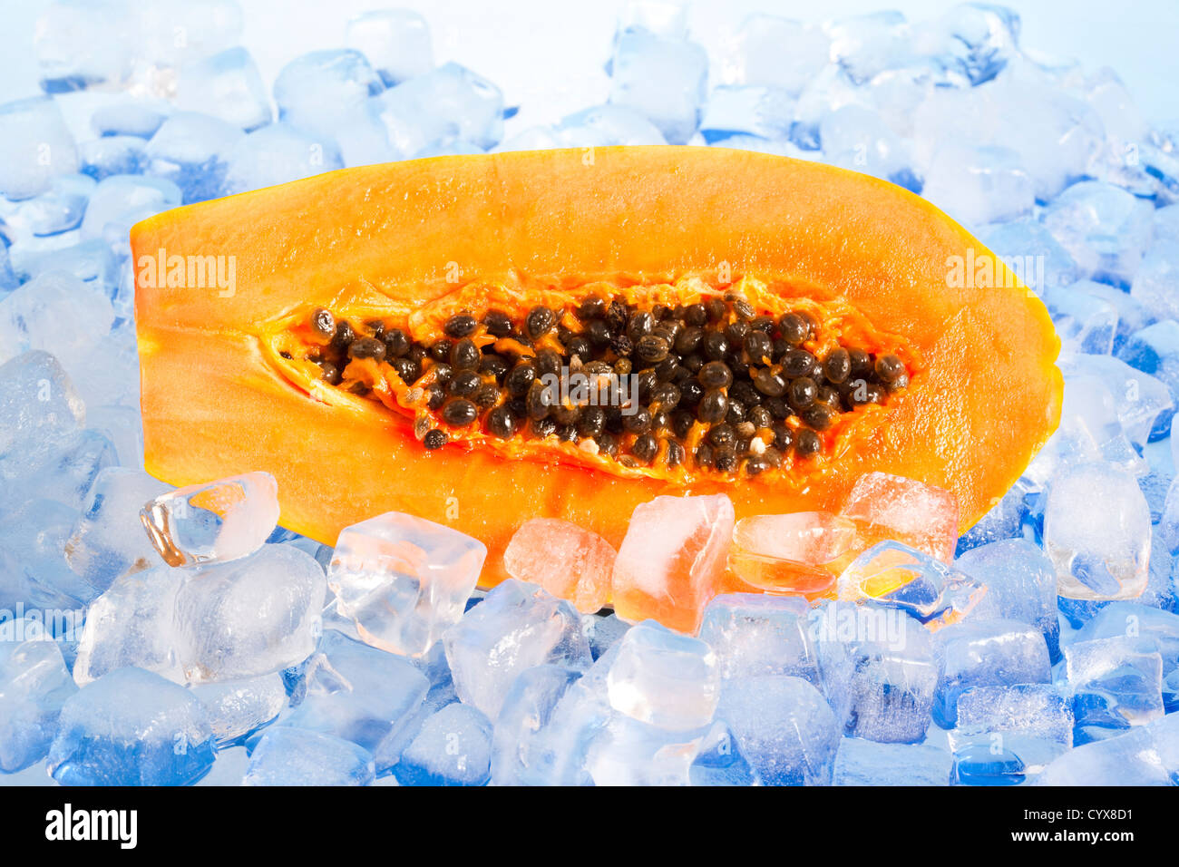 Papaya and ice cubes Stock Photo - Alamy