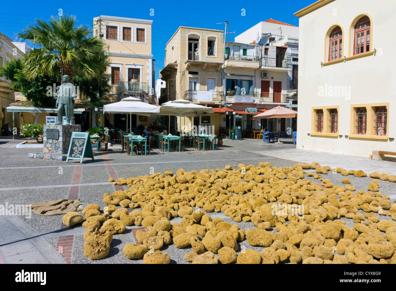 Sea sponges on display on the harbour front, Pothia, Kalymnos, Greece ...