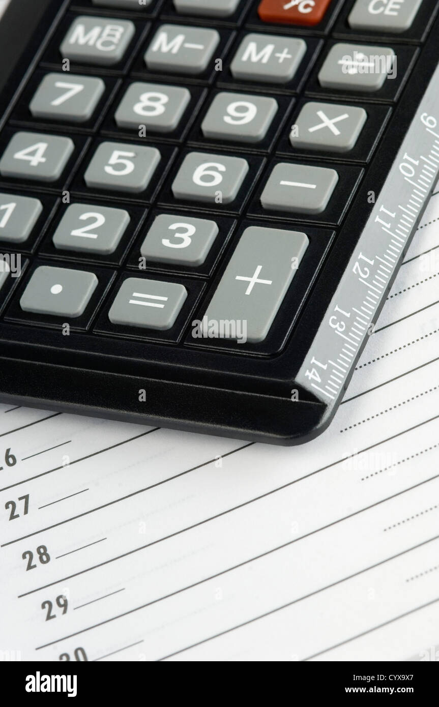 Calculator on a personal organizer Stock Photo - Alamy