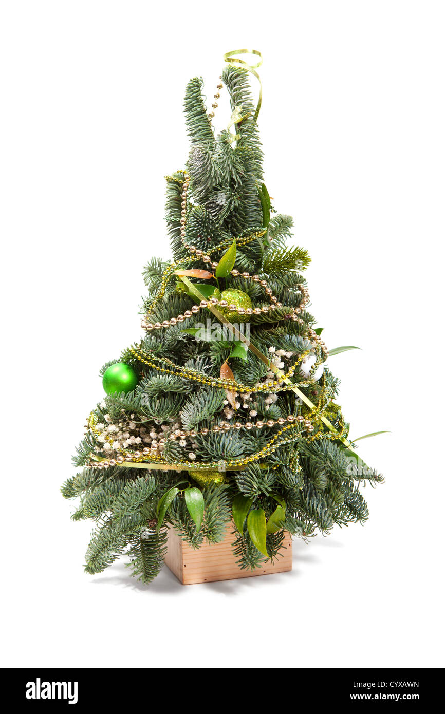 Small Christmas tree, isolated on white background Stock Photo - Alamy